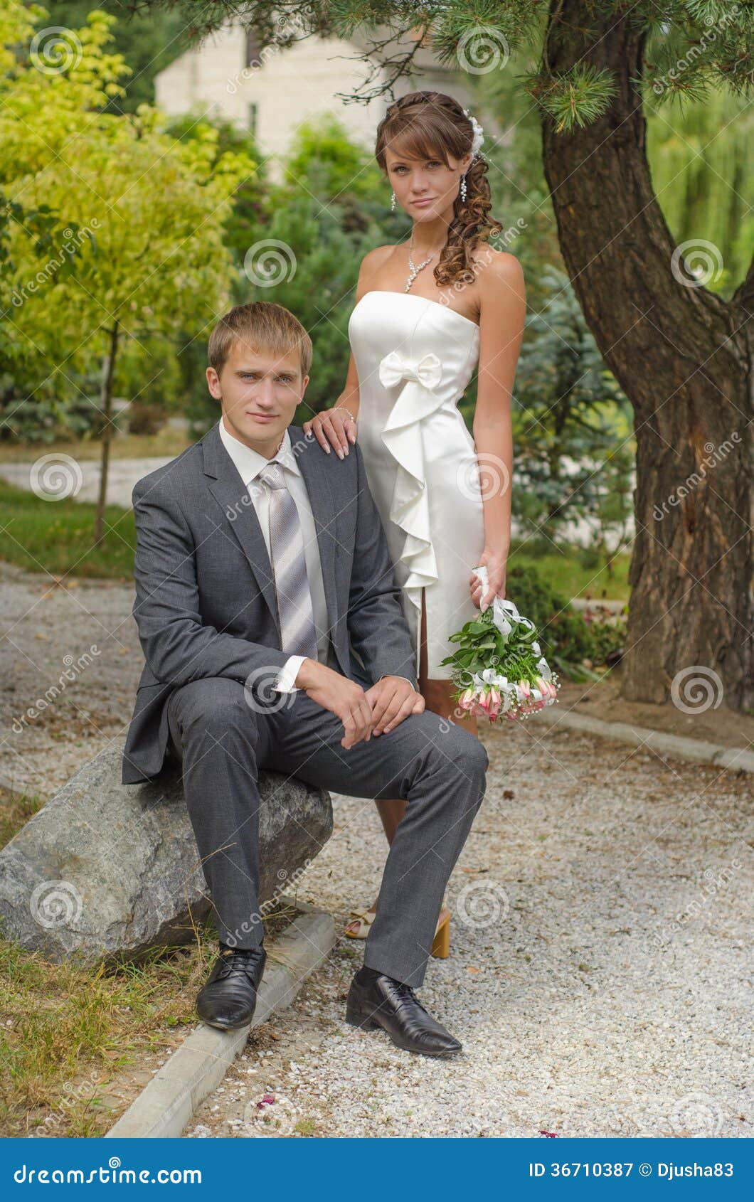 Bride and Her Groom Sitting on a Stone Stock Image - Image of husband ...