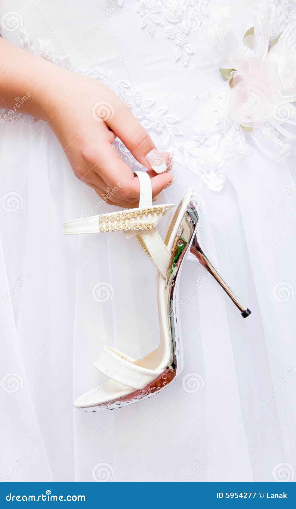 Bride with her shoe stock image. Image of marriage, married - 5954277