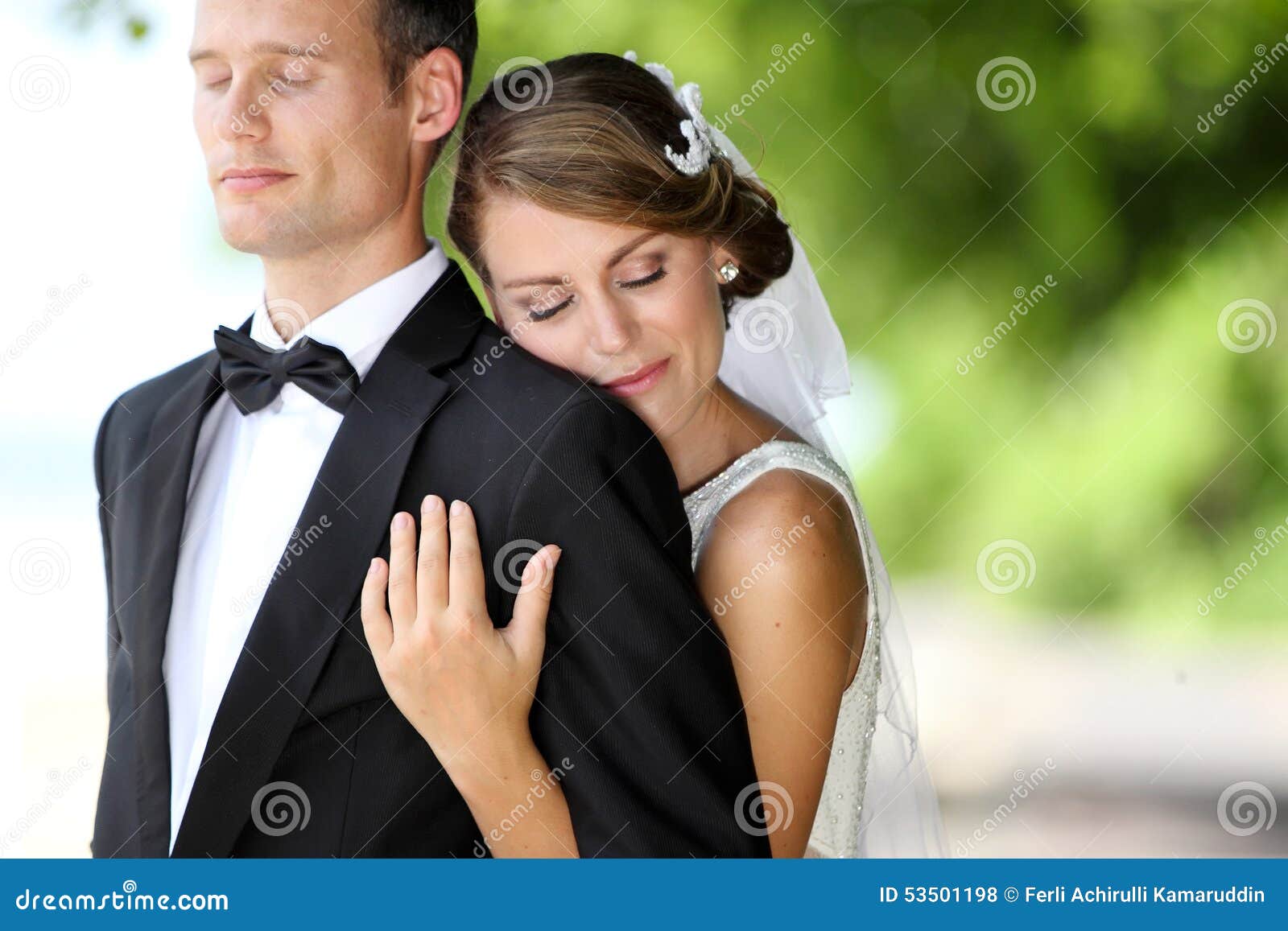 Bride Hugging Her Groom from Behind Stock Photo - Image of handsome ...