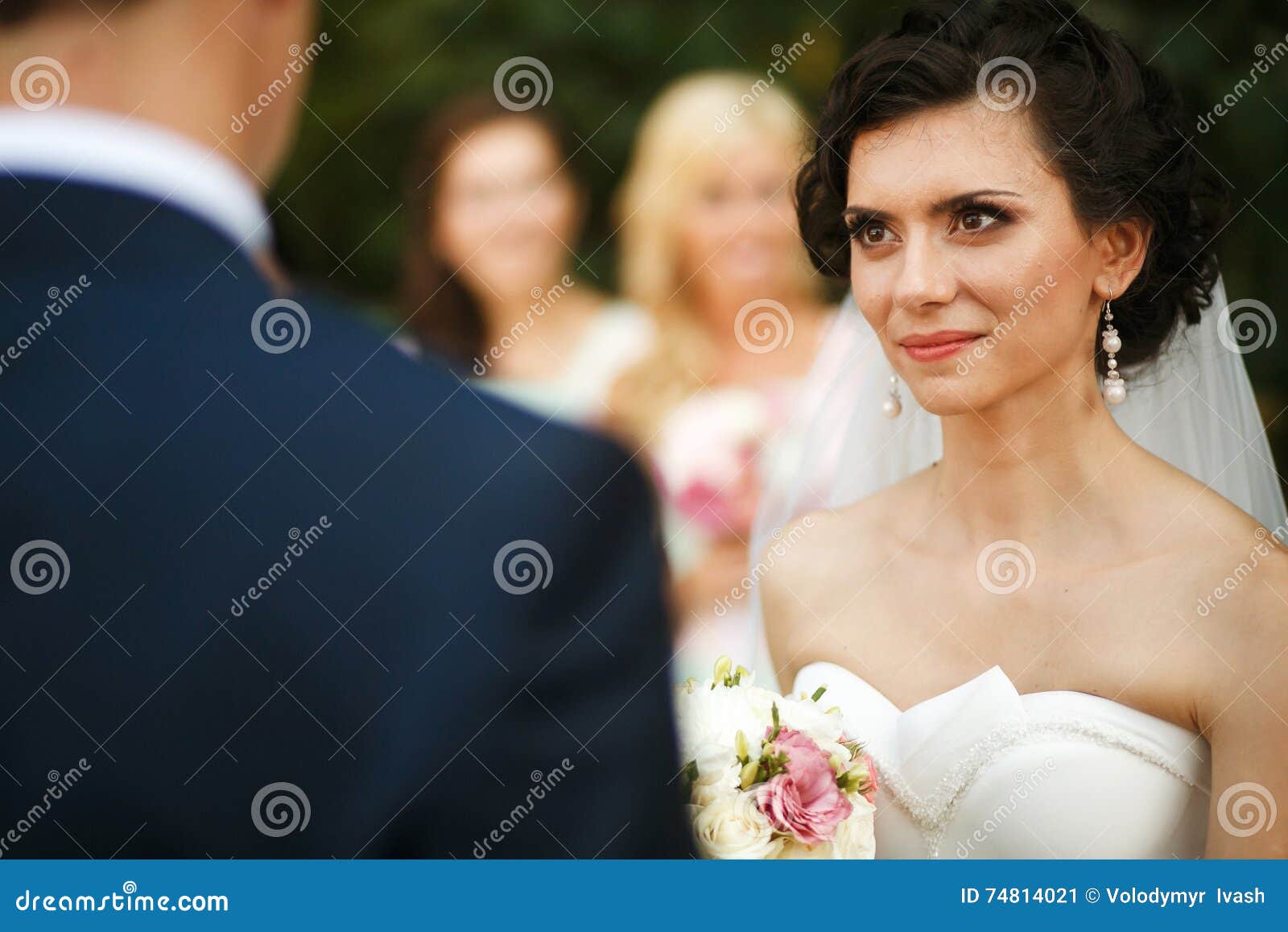 The bride looking on groom stock image. Image of marriage - 74814021