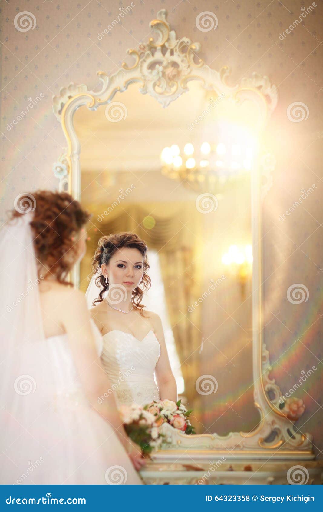 Bride looks in mirror stock photo. Image of happy, girl - 64323358