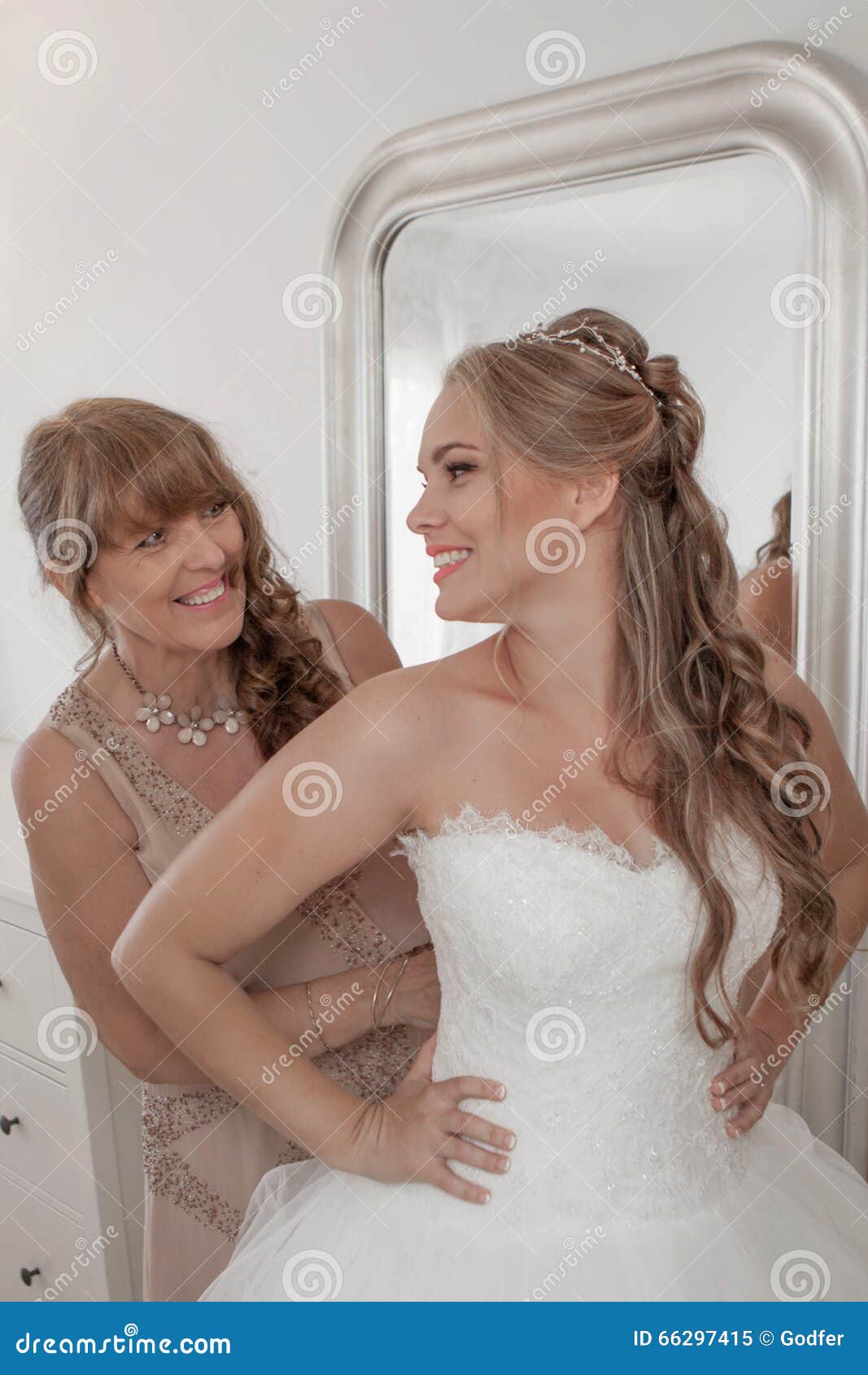 Bride and Mother Dressing on Wedding Day. Stock Image - Image of garter ...