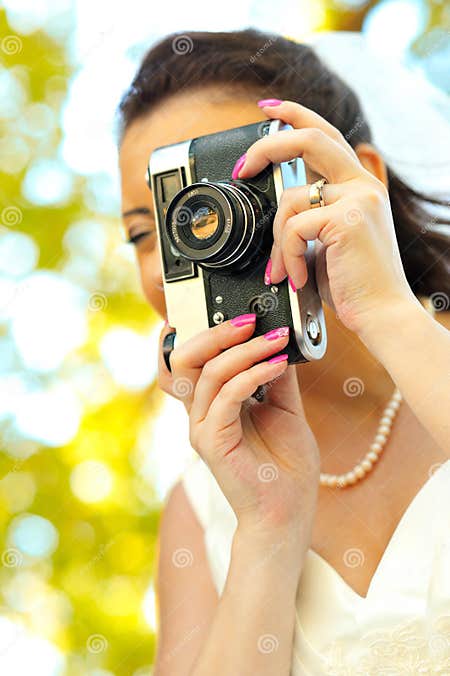Bride with Old Retro Camera Taking Pictures Stock Image - Image of ...
