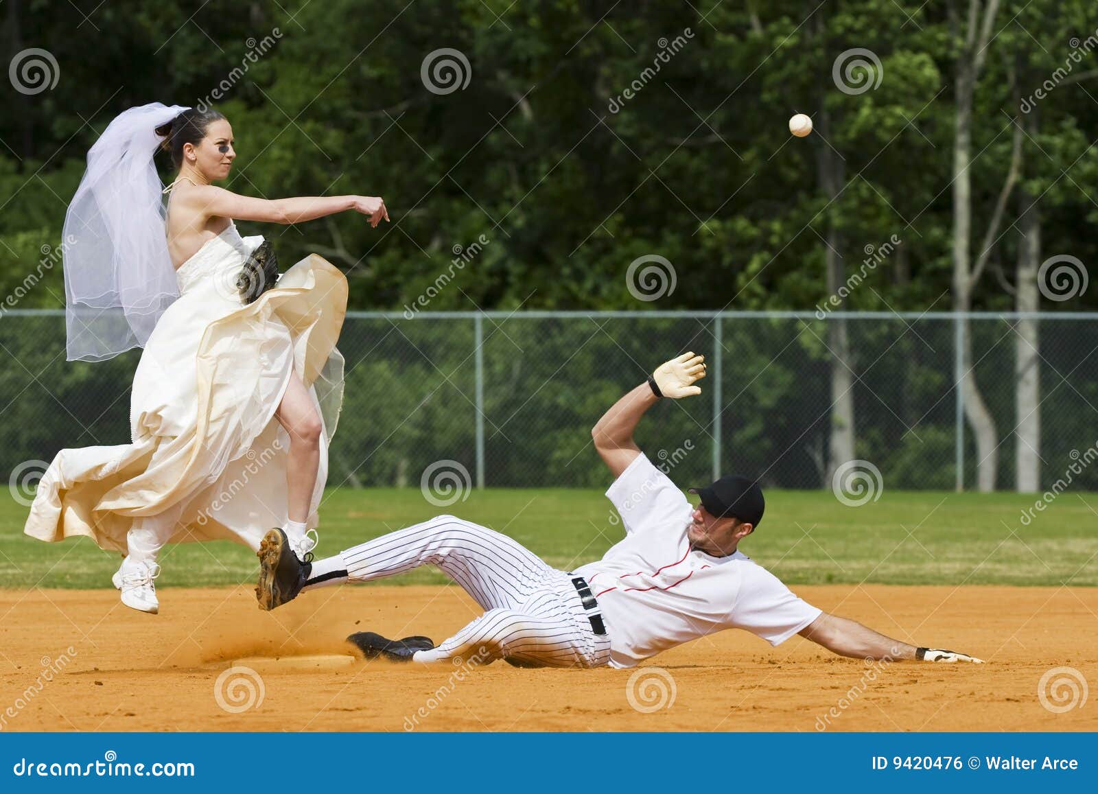 Bride Performing Double Play Stock Photo - Image of human, outdoors ...