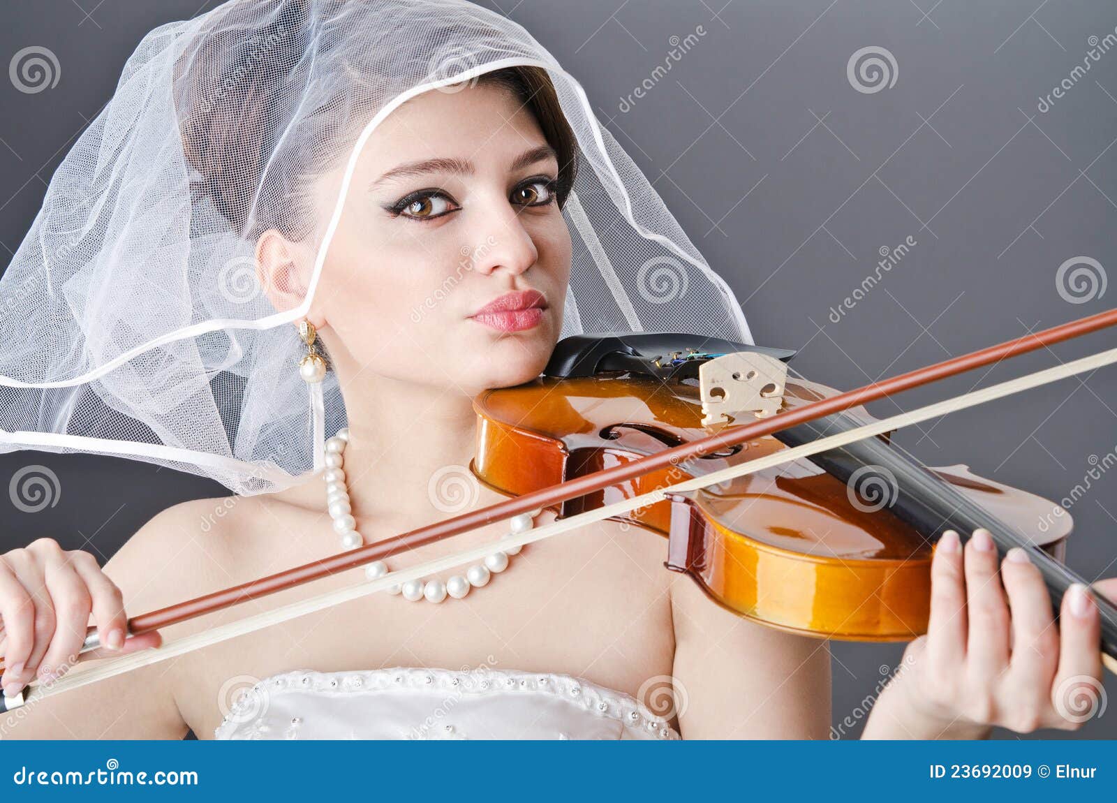 Bride playing violin stock image. Image of happy, fashion - 23692009
