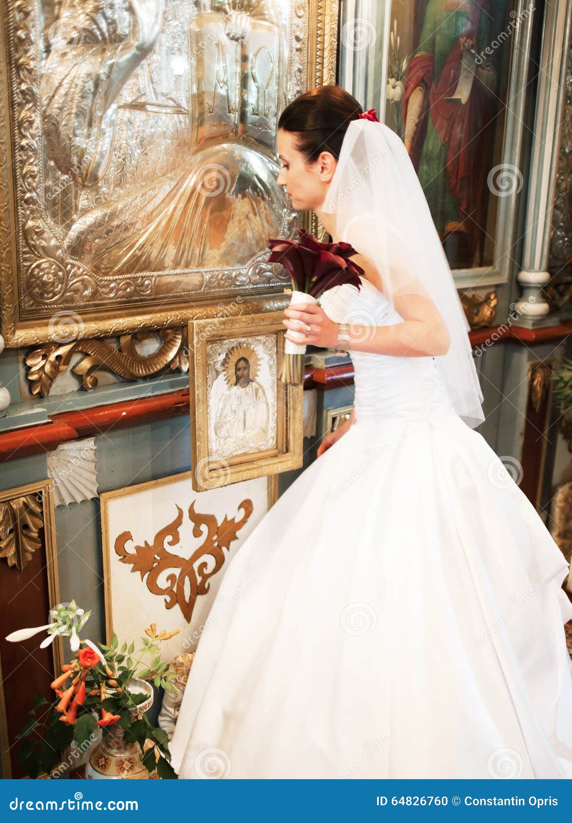 Bride praying in church stock photo. Image of indoors - 64826760