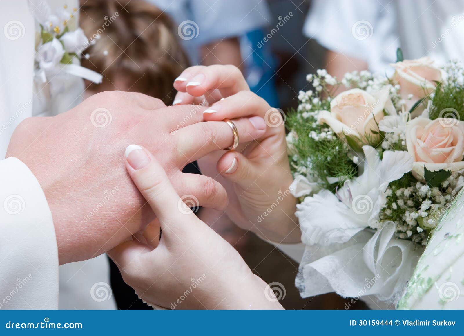 Putting on a wedding ring stock photo. Image of holidays - 30159444