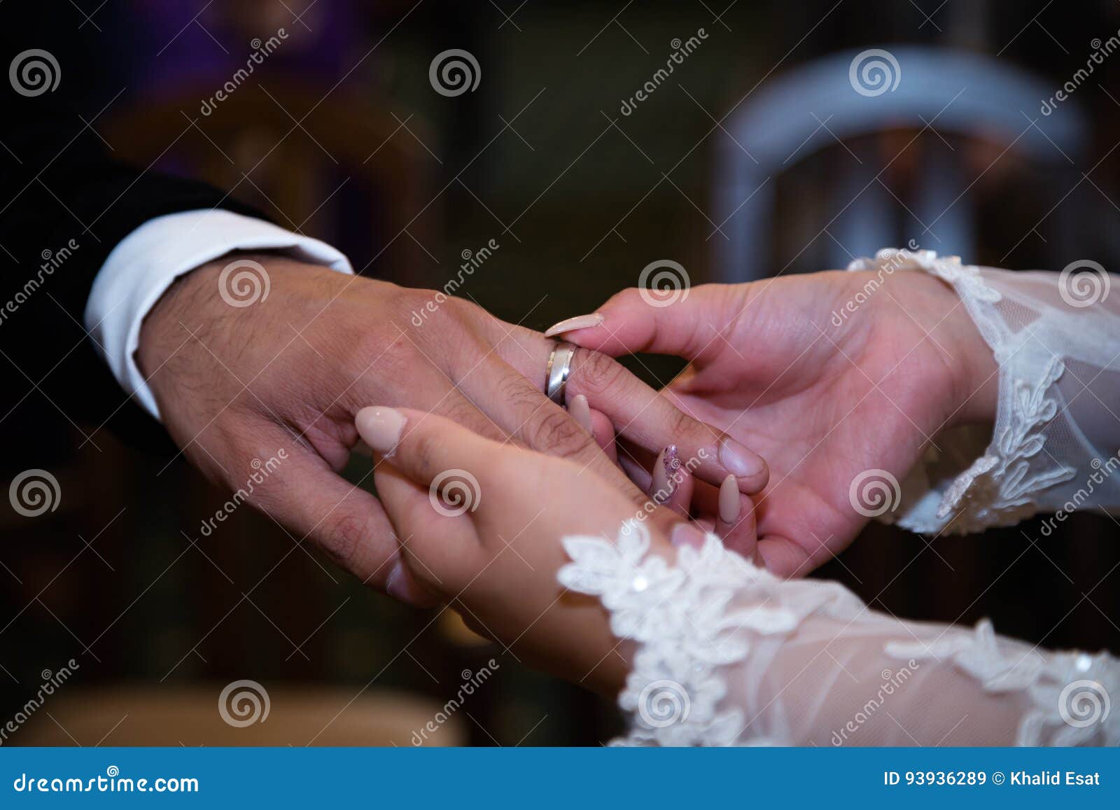 Bride putting ring on stock image. Image of engagement - 93936289