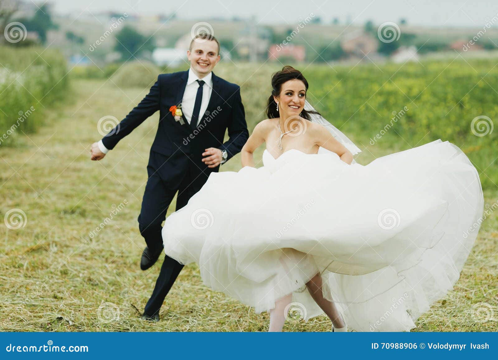 Bride Runs Away from Groom on the Field Stock Photo - Image of groom ...
