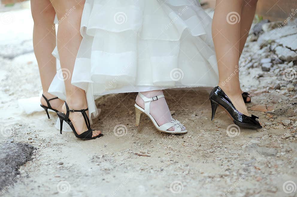 Bride S and Bridesmaid S Legs Stock Photo - Image of contemporary ...