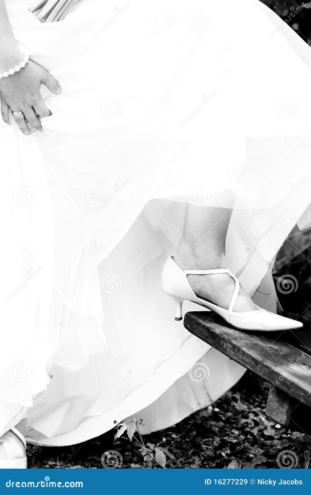 Bride Showing Off Wedding Shoes Stock Image - Image of female, fashion ...