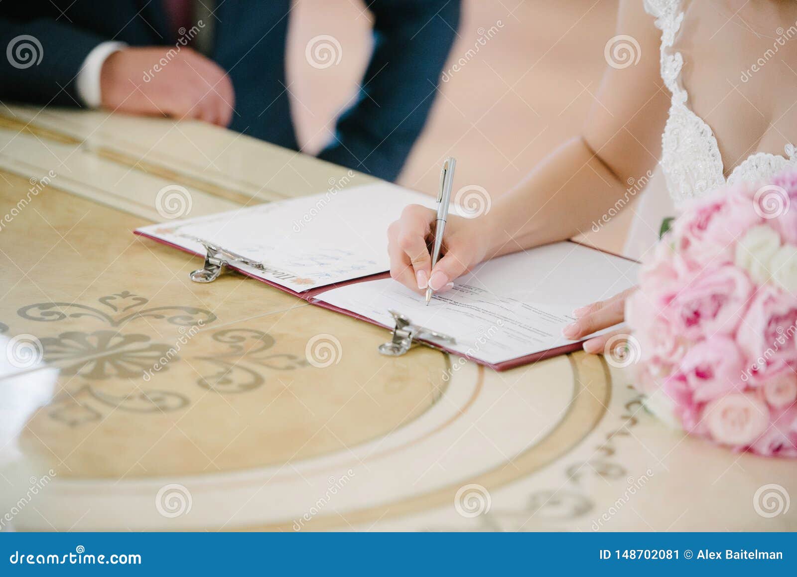 The Bride Signs on the Registration in the Document on the Wedding Day ...