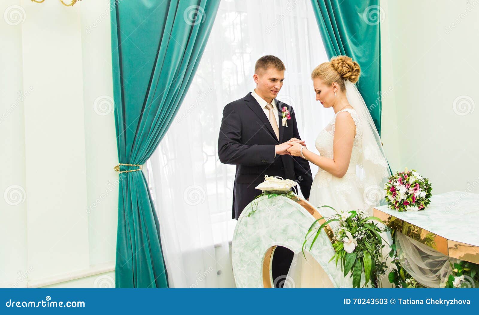 Bride Slipping Ring on Finger of Groom at Wedding Stock Image - Image ...