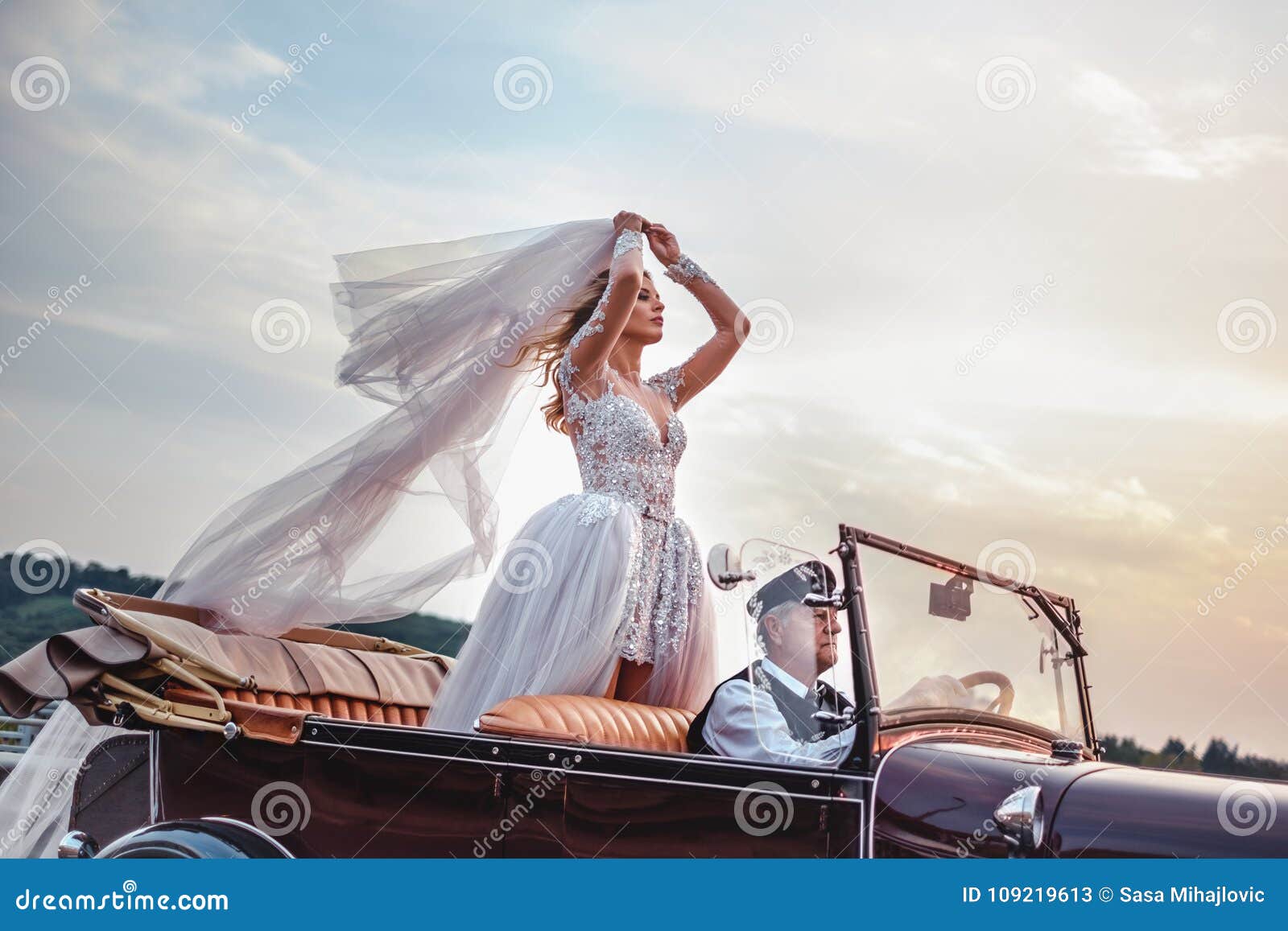 Bride Standing in Classic Convertible while Being Driven Stock Image ...