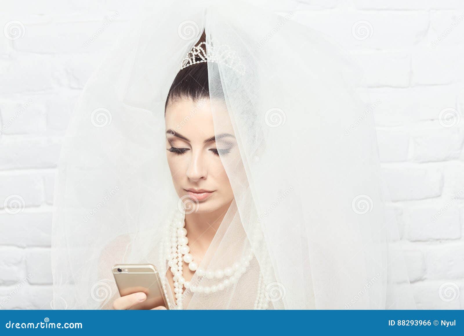 Bride using mobilephone stock photo. Image of color, copyspace - 88293966