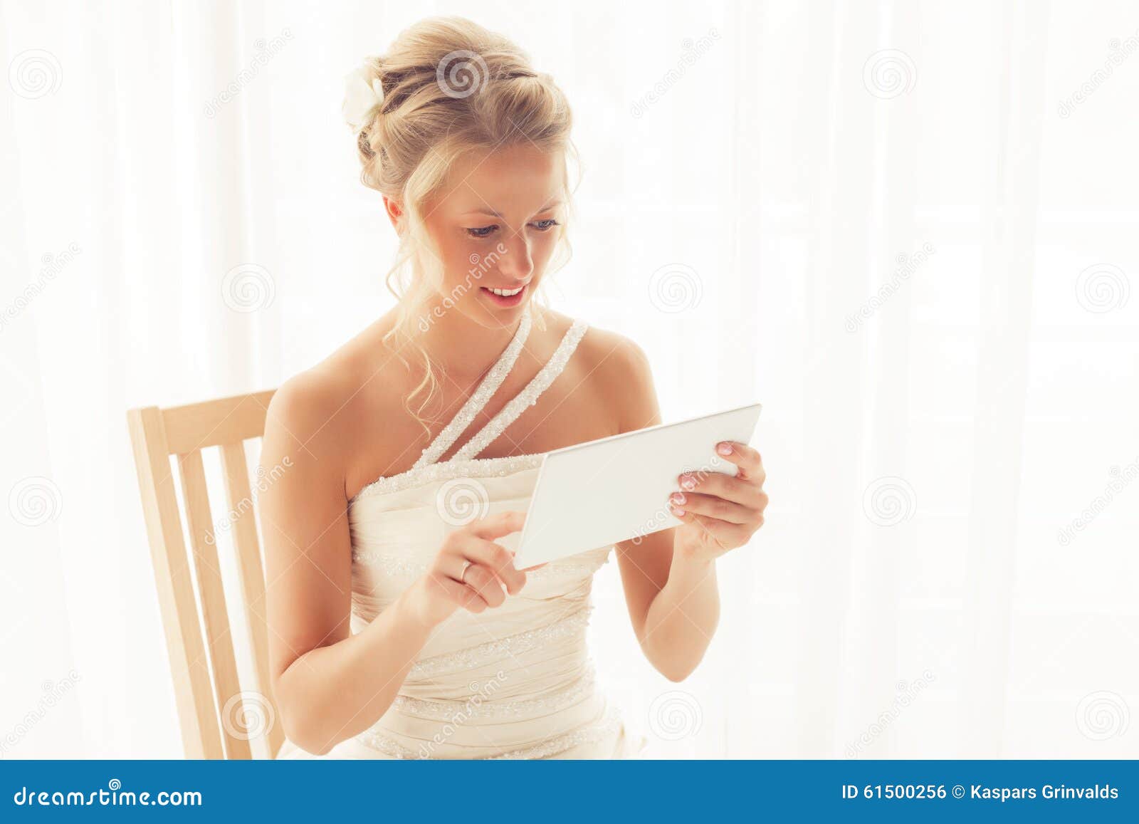 Bride using tablet stock photo. Image of owner, interesting - 61500256