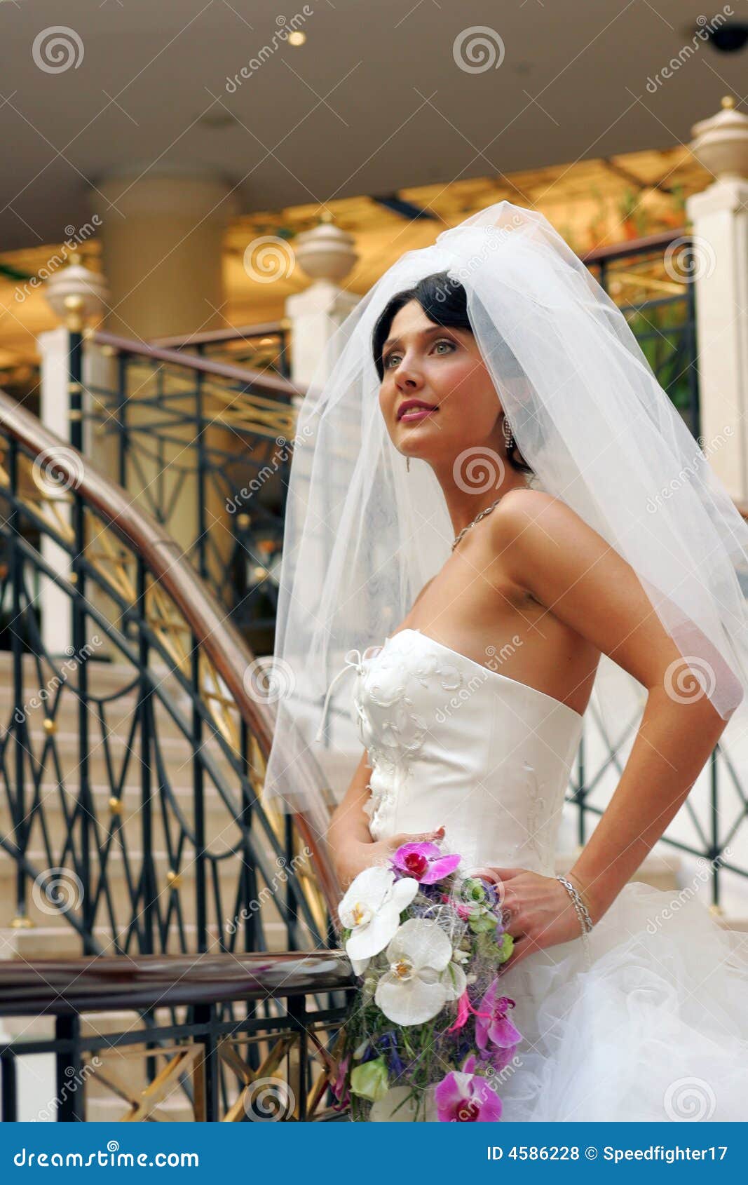Bride walking with bouquet stock photo. Image of loving - 4586228