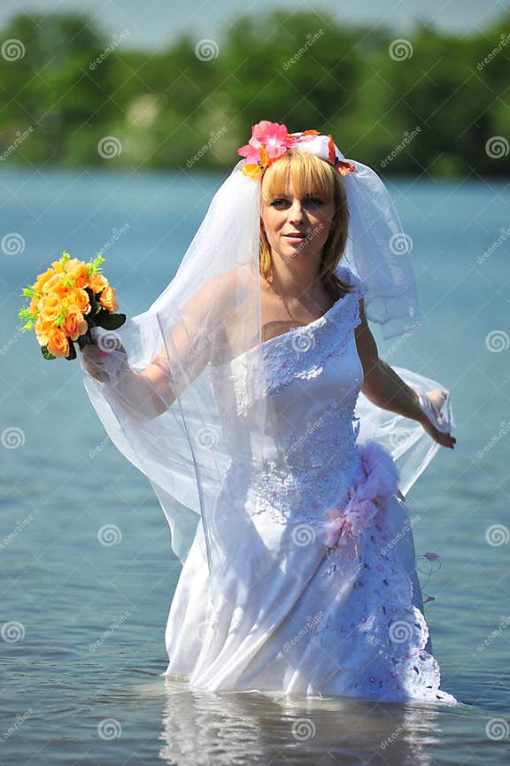 The bride in water stock image. Image of hairstyle, lovely - 14392211