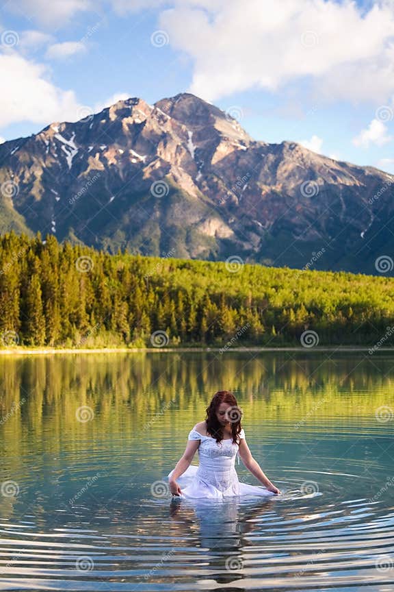 Bride in the Water stock photo. Image of trash, wedding - 2721024