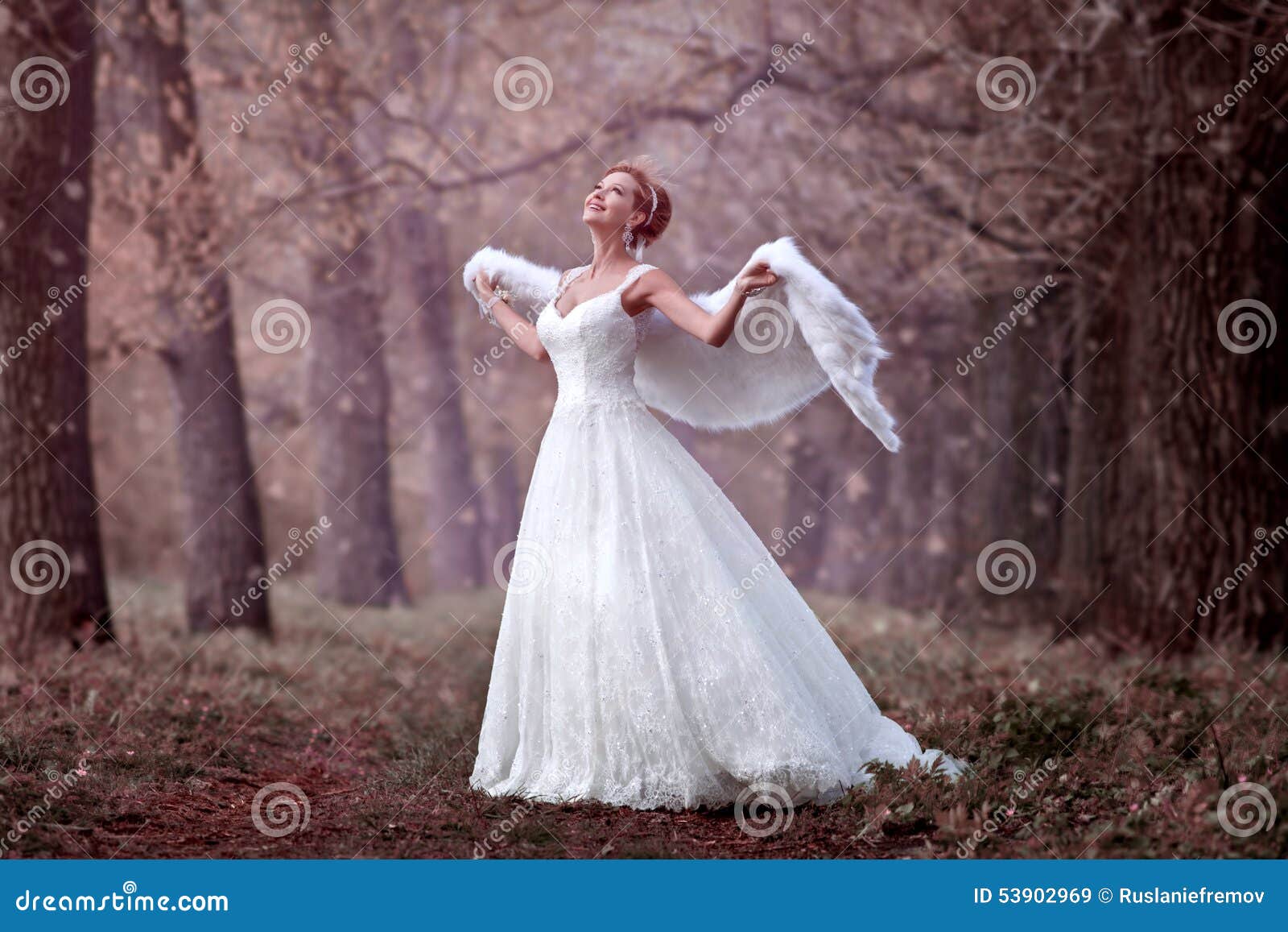 Bride in a Wedding Dress in the Woods Outdoors Stock Image - Image of ...