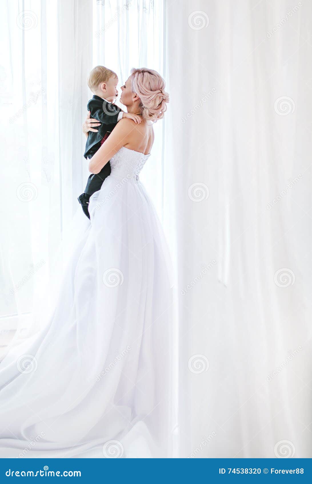 Bride in White Dress and Her Son Stock Photo - Image of beautiful ...
