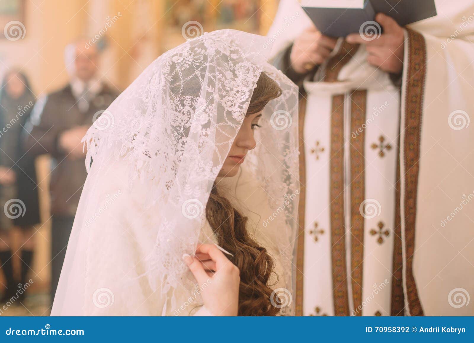Bride in White Veil at the Church during a Wedding Ceremony Stock Photo ...