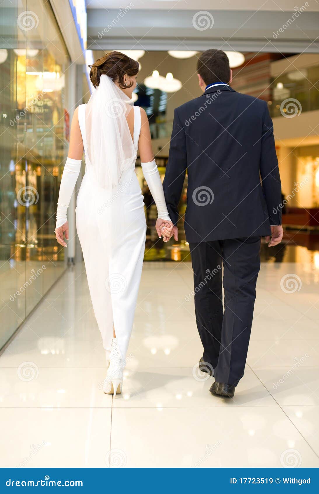 Bridegroom and Bride Walk in Mall Stock Image - Image of veil, hand ...