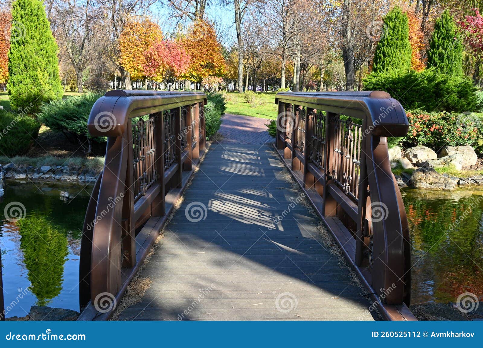 Bridge across the pond stock photo. Image of pond, fence - 260525112
