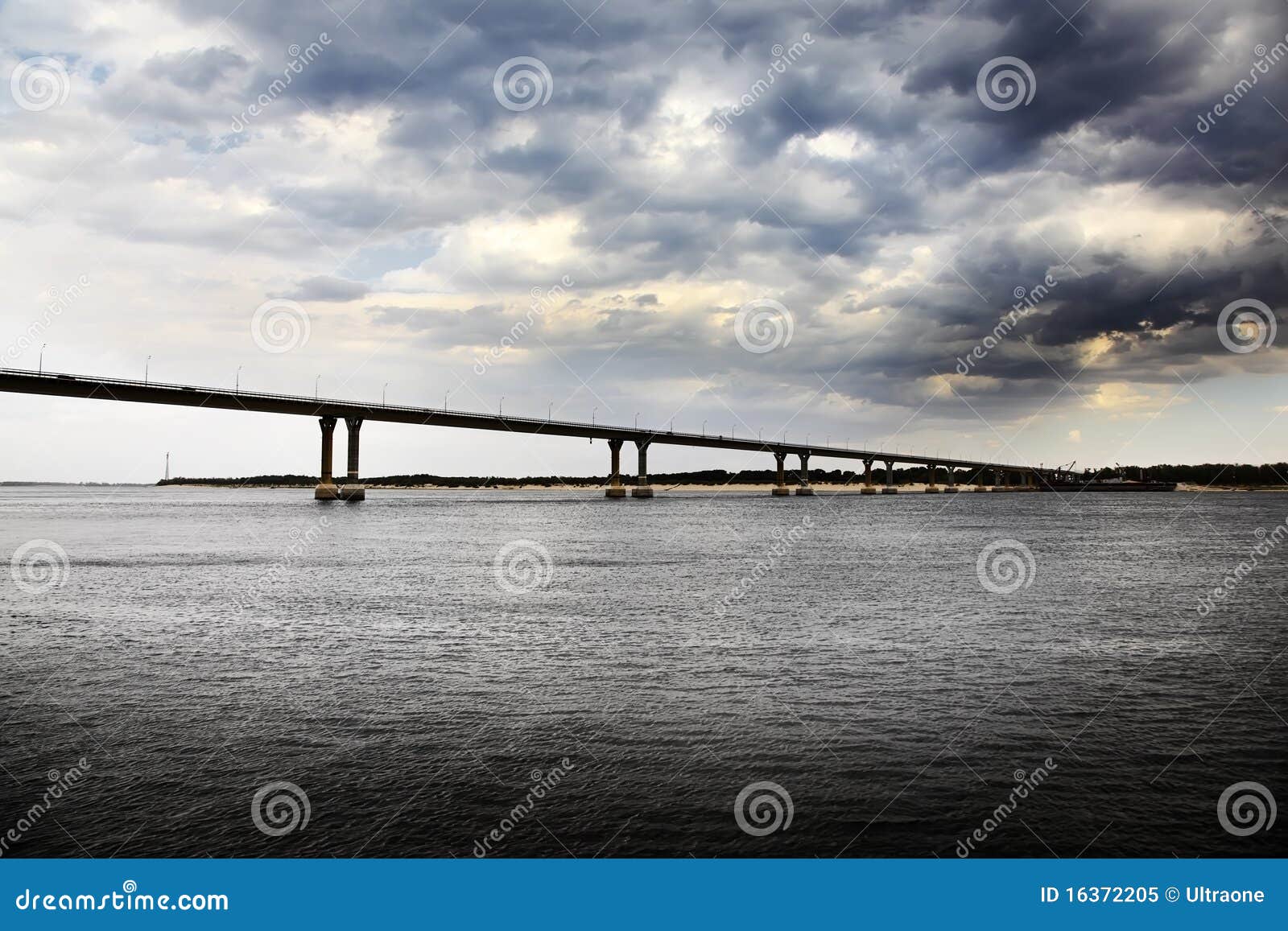 Bridge Across the Wide River and Storm Clouds. Stock Image - Image of ...