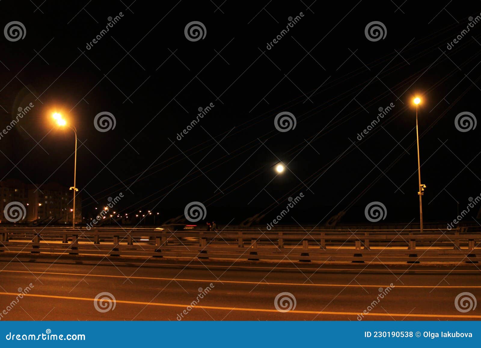 The Moon Lights Up the Road Stock Photo - Image of skyline, idnight ...