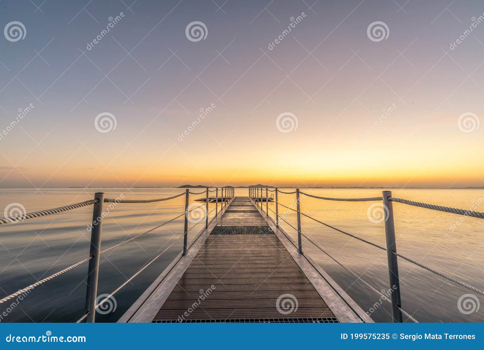 Bridge at beach IV stock image. Image of ocean, morning - 199575235