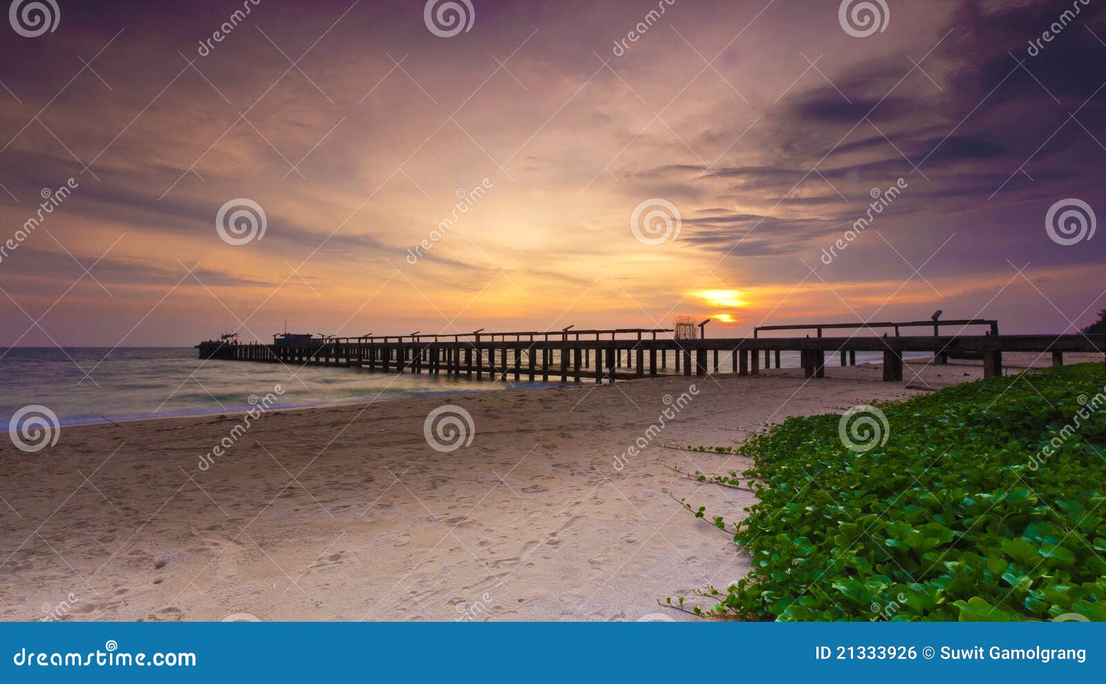 Bridge on beach in Sunset stock photo. Image of reflection - 21333926