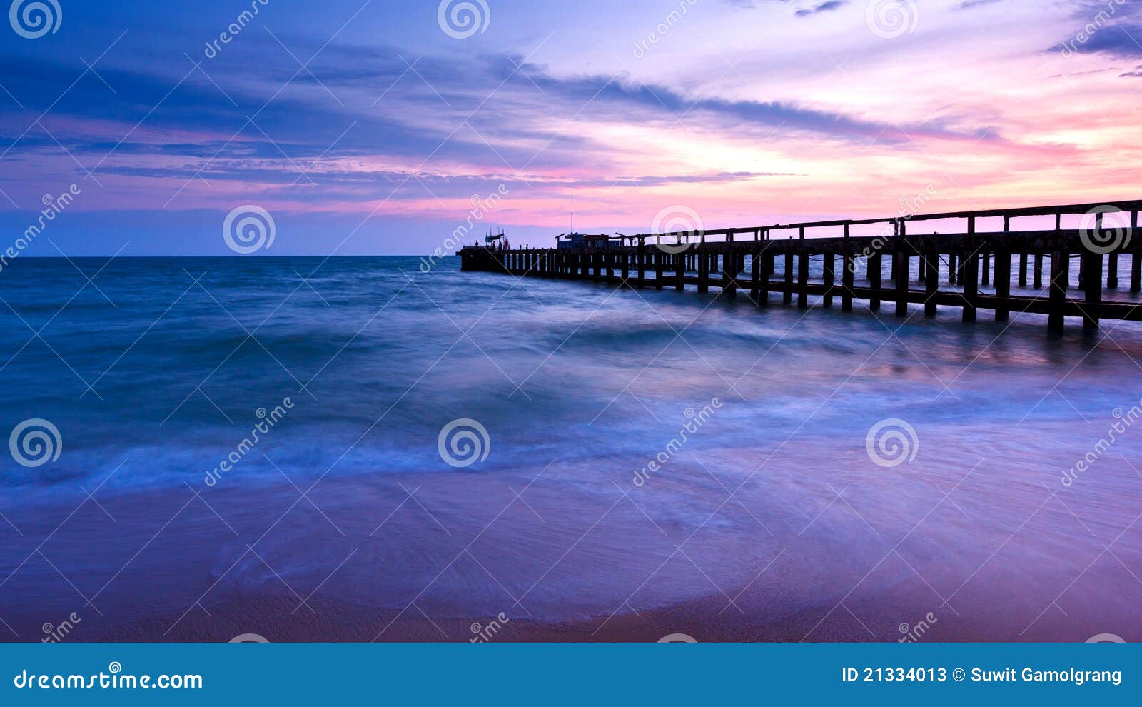 Bridge on beach in Sunset stock image. Image of path - 21334013