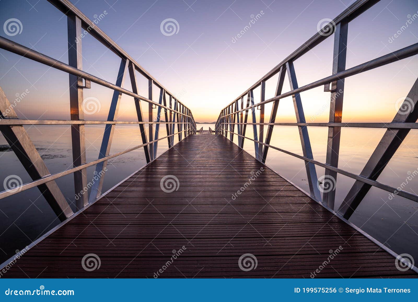 Bridge at beach VI stock photo. Image of sunset, dusk - 199575256