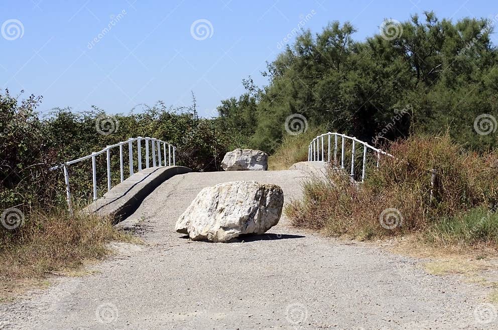 Bridge blocked by rocks stock image. Image of stone, rural - 10501613