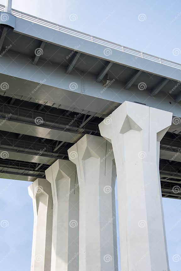 Bridge columns in the sky stock image. Image of traffic - 74913479