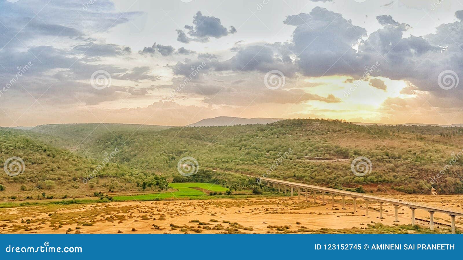 A Bridge Connecting Two Hills Stock Image - Image of clouds, bridge ...