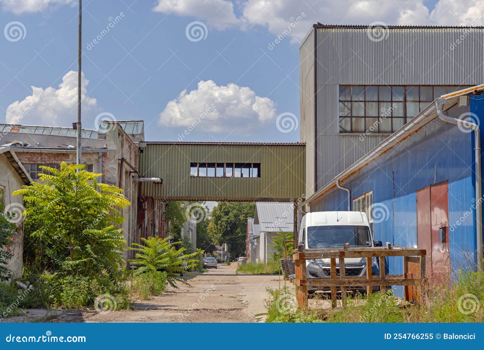 Bridge between Factory Buildings Stock Image - Image of buildings ...