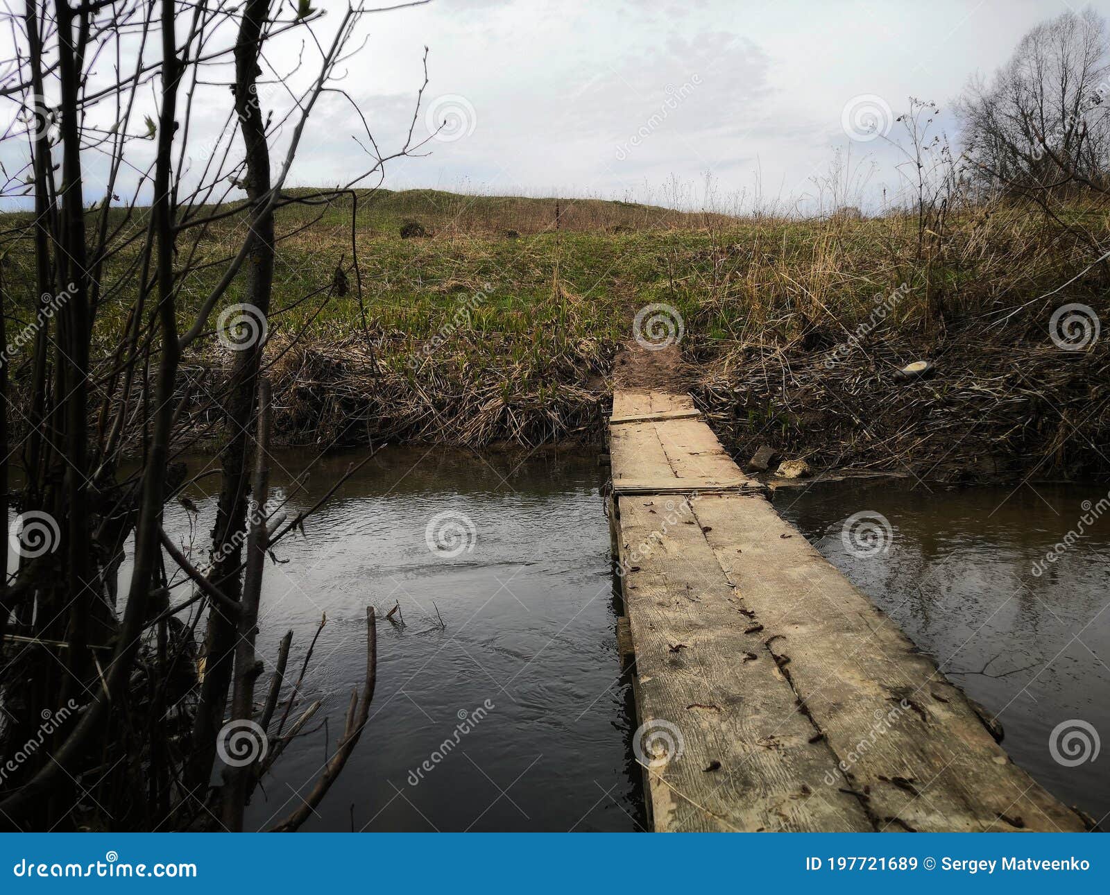 Bridge between the fields stock image. Image of water - 197721689