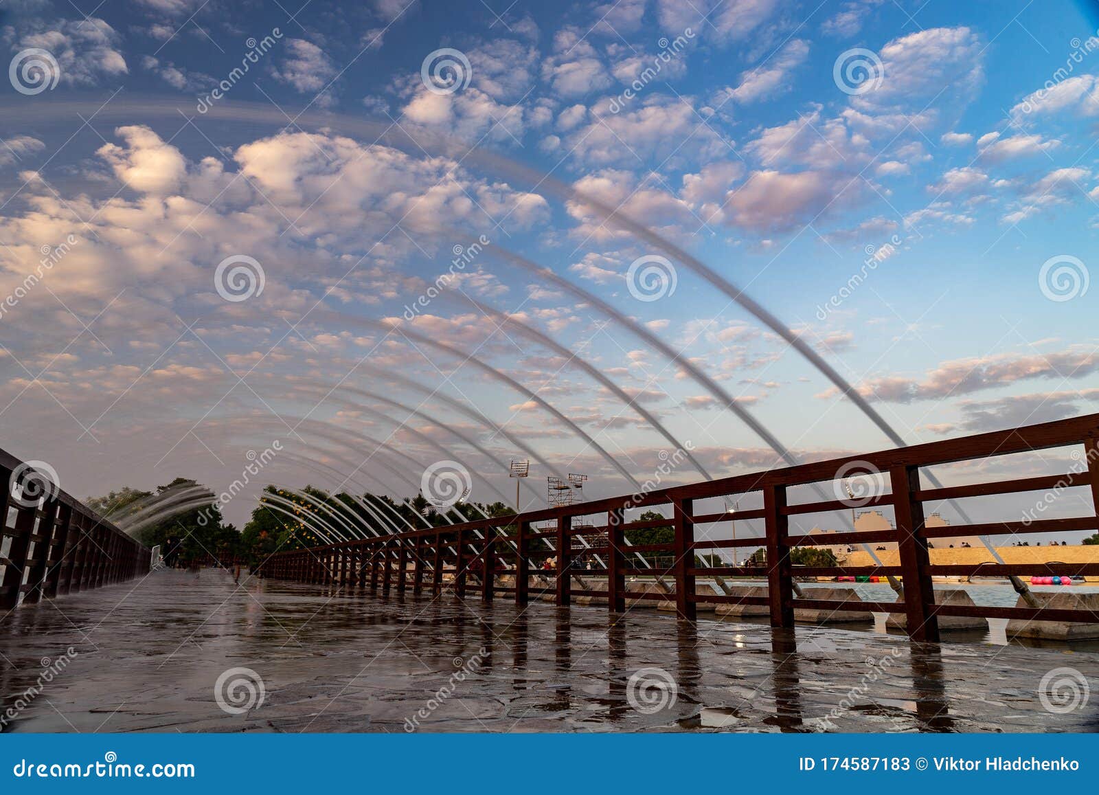 Bridge with Fountain in the Aspire Park during Dramatic Sunset in Doha ...