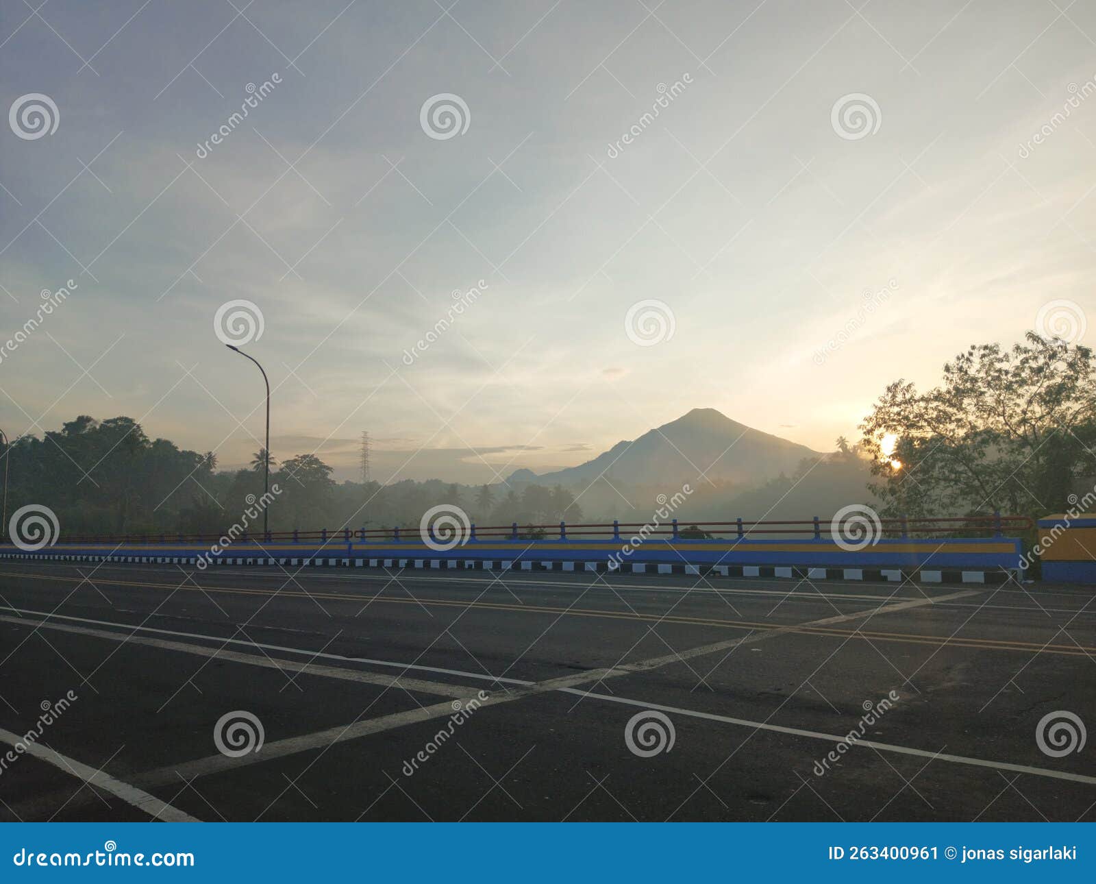 Bridge in Front of the Mountain Stock Image - Image of cloud, road ...