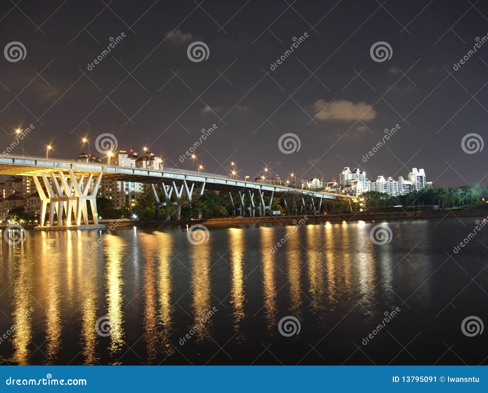 A Bridge with Light Reflections on the Water Stock Image - Image of ...