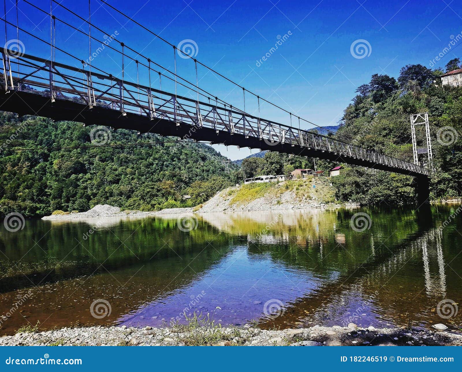Bridge in nature and lake stock image. Image of depicting - 182246519