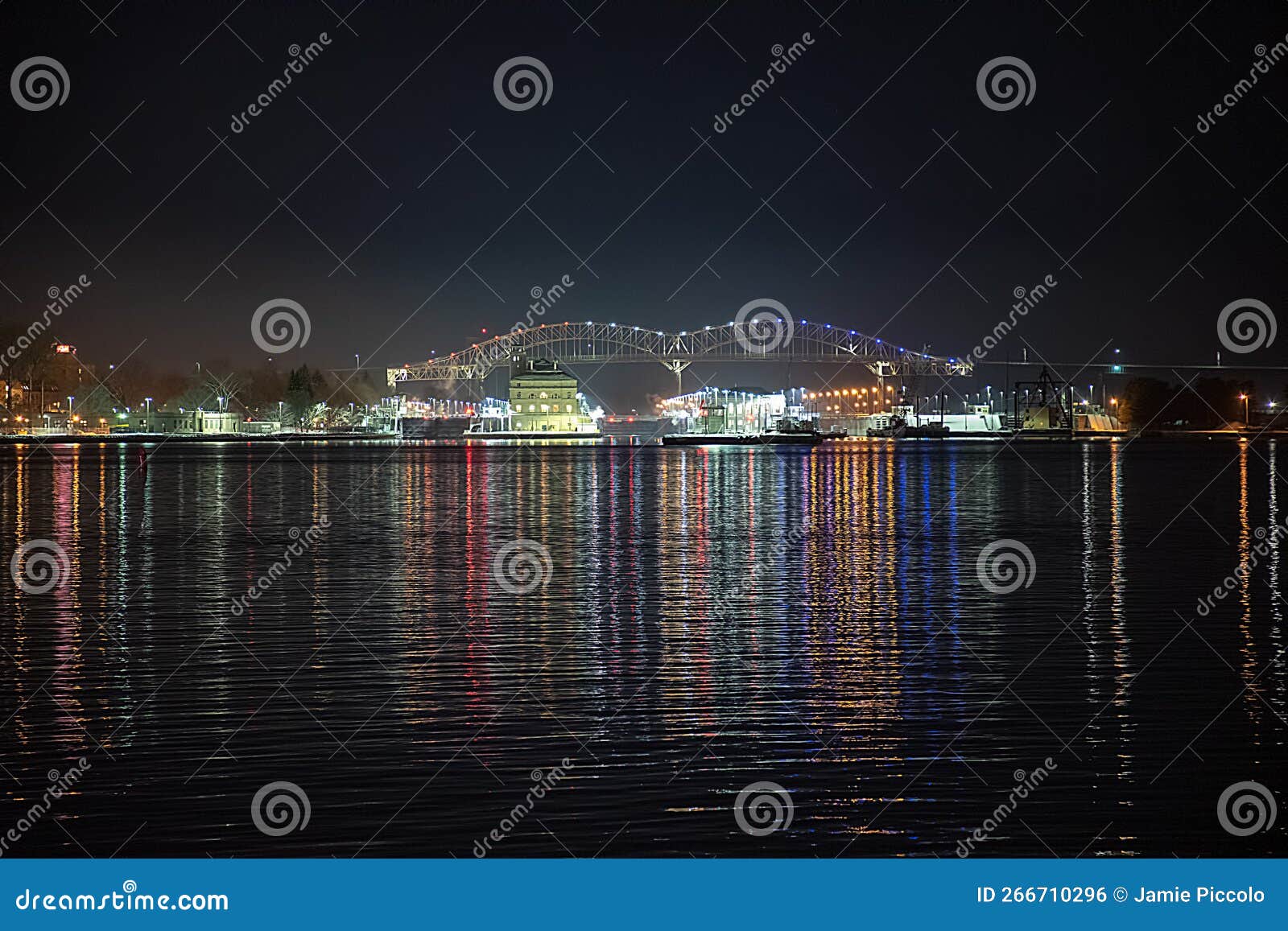 Bridge at night stock photo. Image of skyscraper, reflection - 266710296