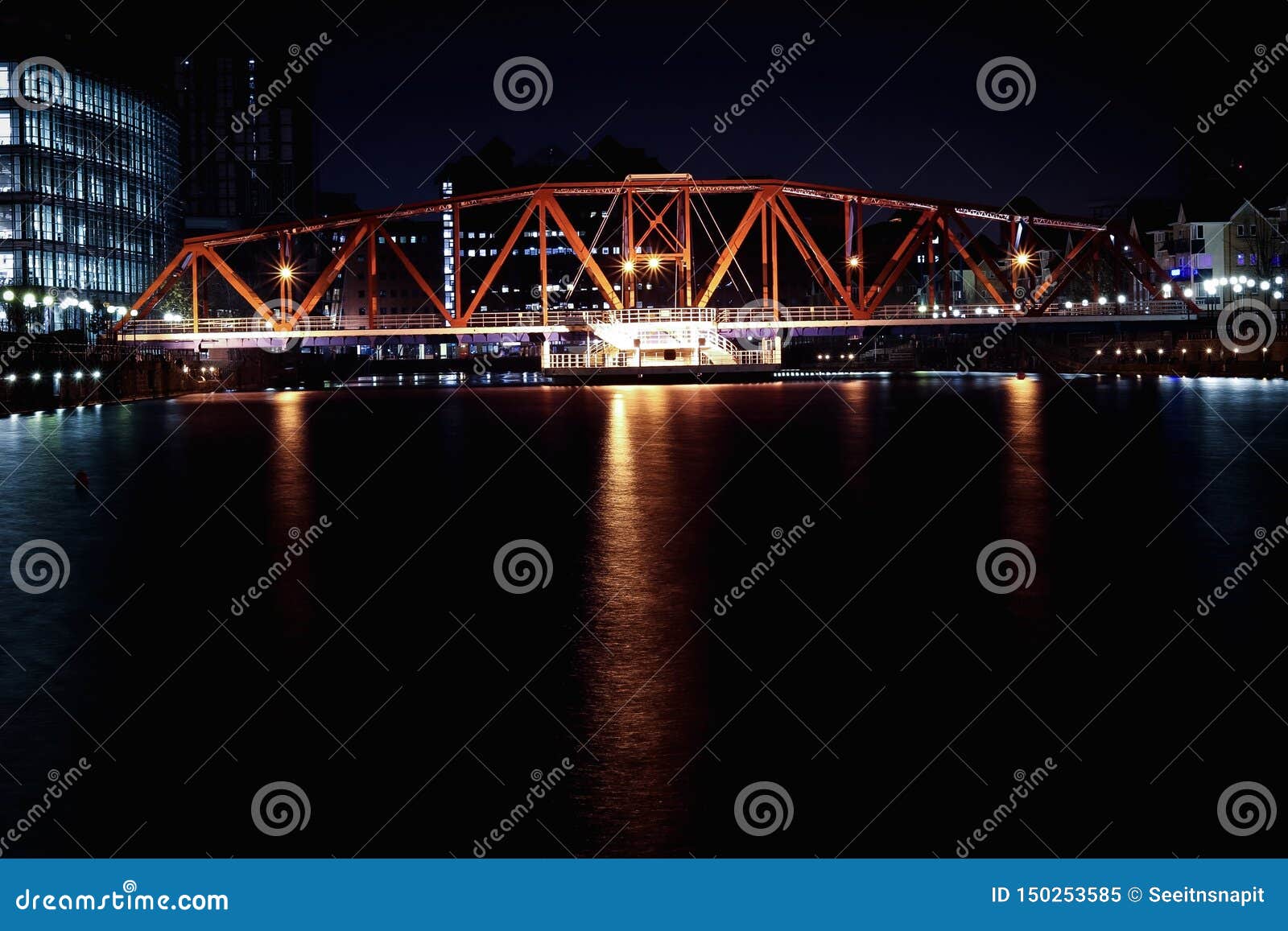 Bridge over water at night editorial image. Image of night - 150253585