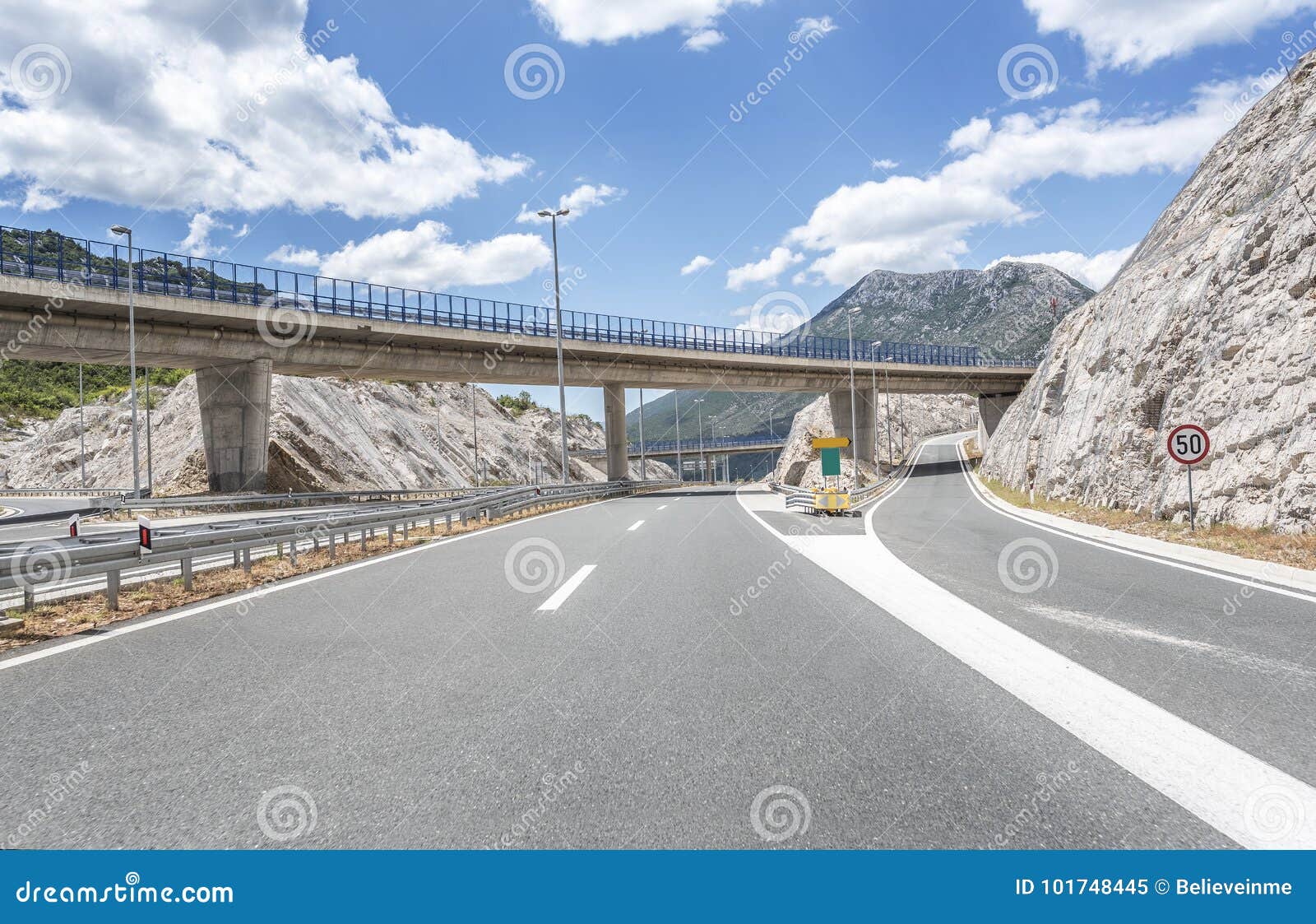 Bridge over a highway. stock image. Image of traffic - 101748445