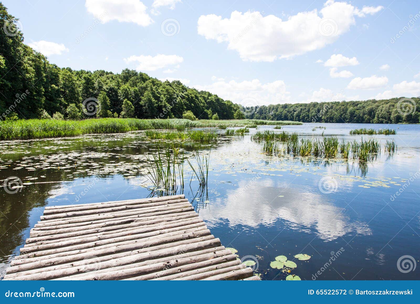 Bridge over a lake stock photo. Image of sunrise, peaceful - 65522572