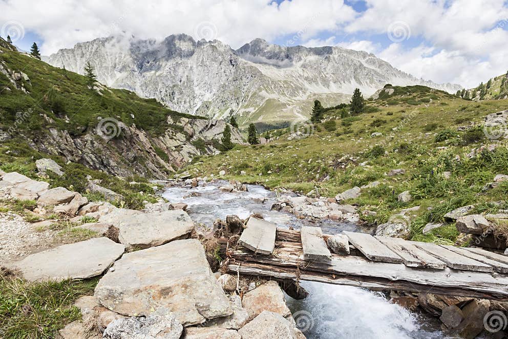 Bridge Over Mountain Creek in Alps. Stock Image - Image of peaks, range ...