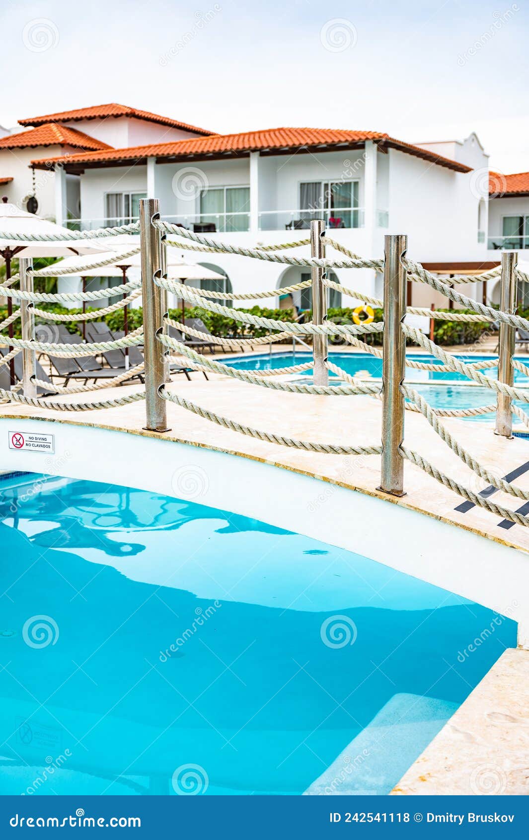 Bridge over the pool stock photo. Image of aqua, exterior - 242541118