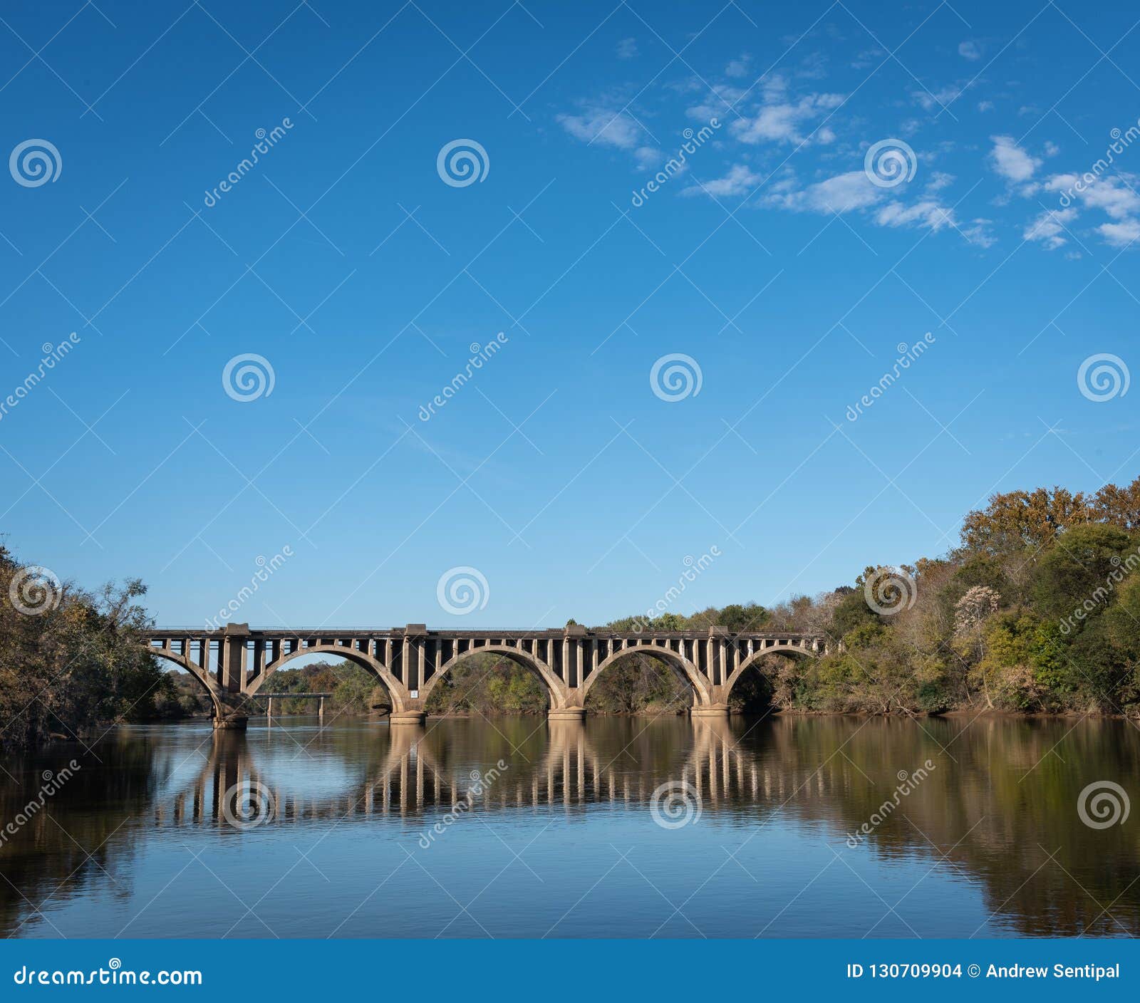 Bridge Over River with Reflections with Copy Space. Stock Photo - Image ...